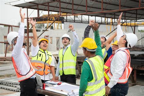 Construction Engineers Architects And Foremen Form A Group Participate In A Meeting To Plan