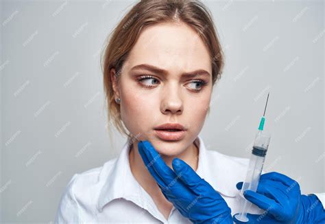 Premium Photo Woman Syringe Anesthesia Botox Injection Doctor Blue Gloves