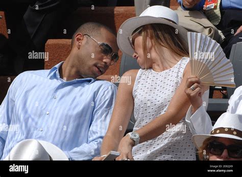 French Football Player Thierry Henry And His Wife Nicole Attend The Men