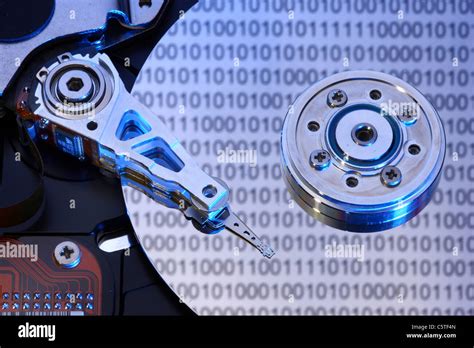 Computer Hard Drive Opened Writingreading Head And Hard Disk Binary Code Numbers Are