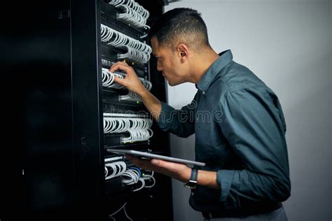 engineer man thinking and tablet in server room for information