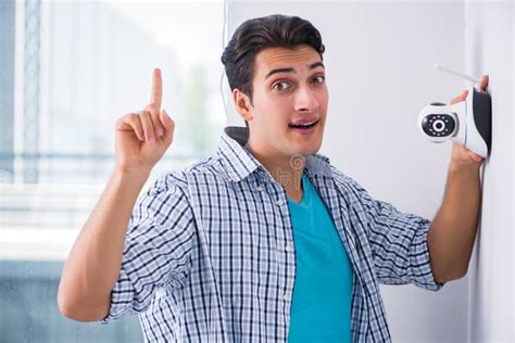 The Man Installing Surveillance Cctv Cameras At Home Stock Photo Image Of Private