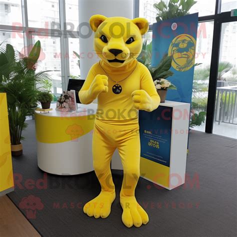 Lemon Yellow Panther Mascot Costume Character Dressed With A Pencil