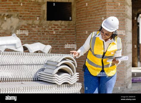 African Black Women Worker Work In Construction Site For Site Inspector