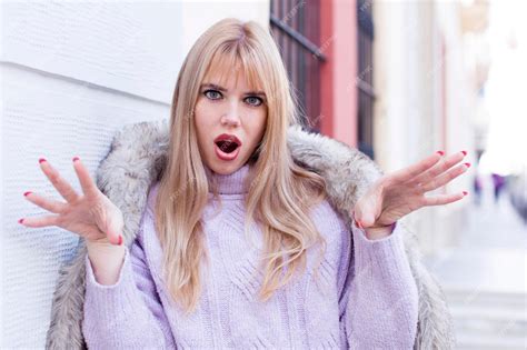 Premium Photo Screaming In Panic Or Anger Shocked Terrified Or Furious With Hands Next To Head