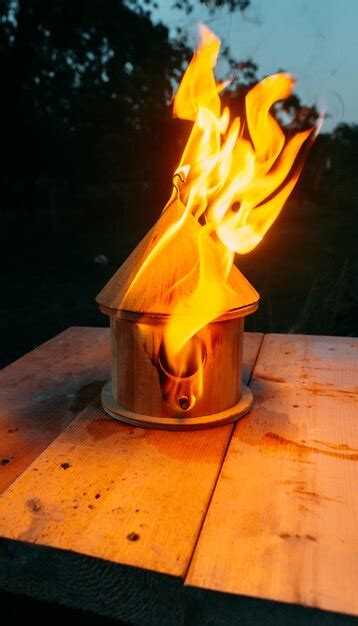 Premium Photo Close Up Of Fire On Table