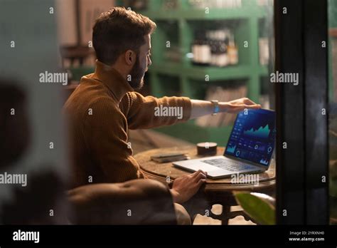 Modern Businessman Reviewing Analytics Dashboard And Performance
