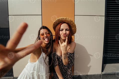 Two Attractive Young Women Fooling Around In Fresh Air 20453684 Stock