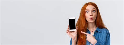 Free Photo Curious And Amused Lovely Redhead Woman With Long Red Hair