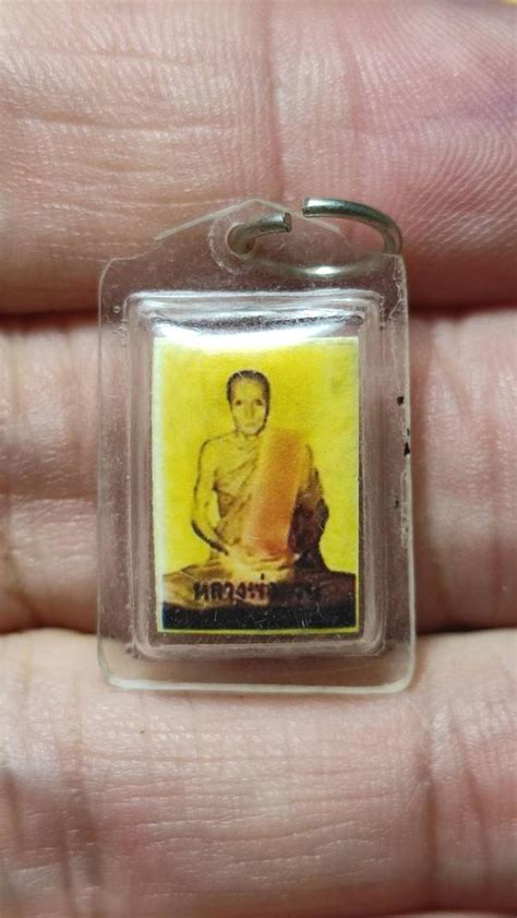 หลวงพ่อกวย หลังตะกรุดสามดอก Ennxo