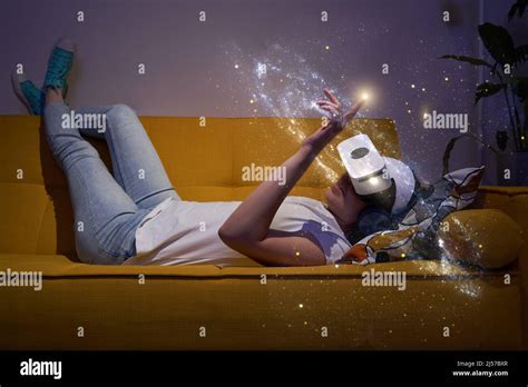 Woman Is Using Virtual Reality Headset Elements Of This Image Furnished By Nasa Concept Of