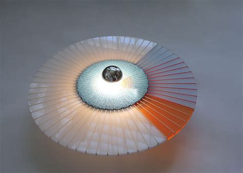 Marta Bakowski Uses Thread To Pattern Rays Lamps
