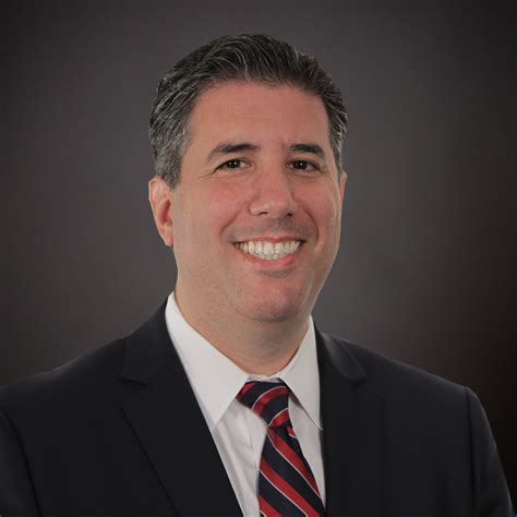 The Honorable Michael Rigas Team