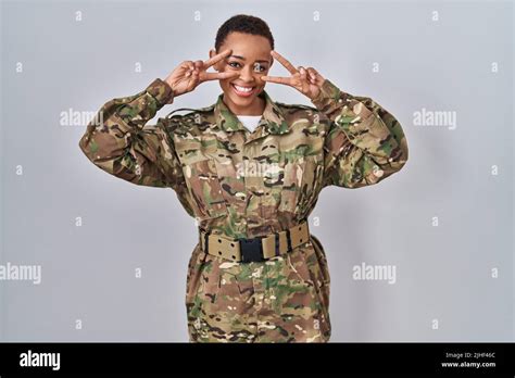 Beautiful African American Woman Wearing Camouflage Army Uniform Doing
