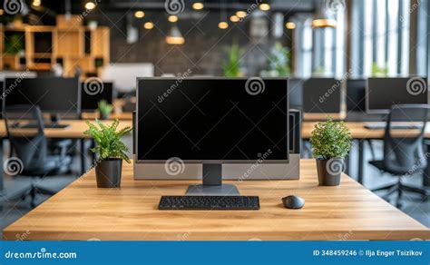 Modern Office Workspace With A Computer Monitor Keyboard Mouse Plants And Blurred Interior