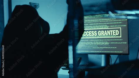 Professional Hacker Successfully Using Code Designing Virus System And Raised Hands Celebrating