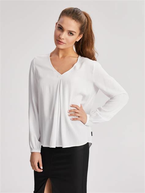 Жіноча блуза з довгими рукавами та V подібним вирізом на спині біла купити в Україні Київ Diverse