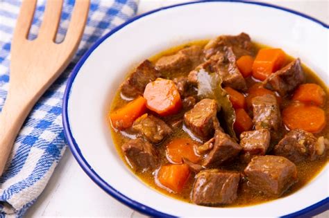 Premium Photo Braised Beef With Potatoes And Carrots