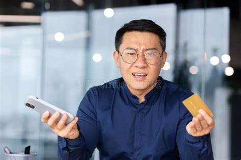 Portrait Of Disappointed And Angry Businessman Inside Office Cheated