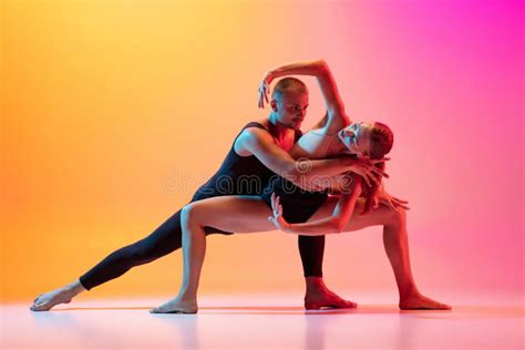 Two Dancers Stylish Sportive Couple Male And Female Models Dancing