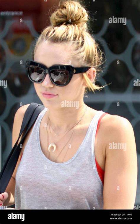 Miley Cyrus And Fianc Liam Hemsworth Wear Workout Attire As They Leave
