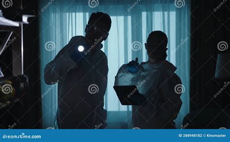 Forensic Team Searh And Evidence Marker In Crime Scene Training Stock