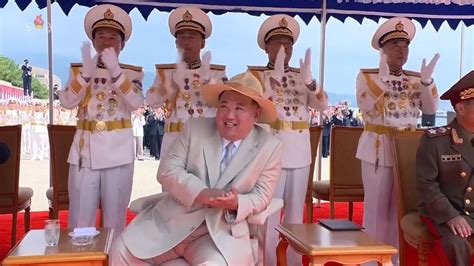 North Korea Kim Jong Un Dons Navy Hat As He Watches Launch Of Hero Kim