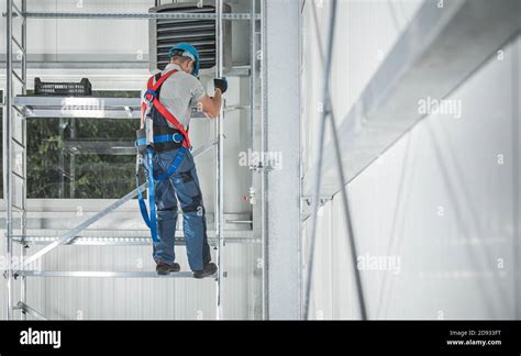 Construction Worker Climbing Scaffolding Hi Res Stock Photography And Images Alamy