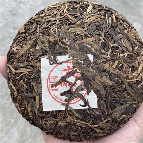 2009年 珍藏品古树茶冰中岛生普洱茶250g小饼云南双江勐库冰岛茶叶精制厂出品源自海拔2000米以上植株高4 8米高的乔木型云南大叶