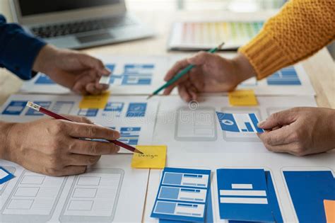 A Team Of Ux Designers Works On A New Website Layout Plan Mobile Web Application Development In