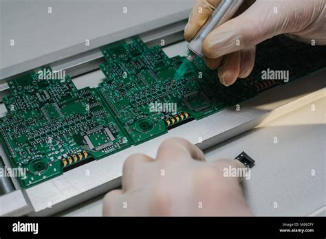 The Assembly Of Computer Units Technological Process Stock Photo Alamy