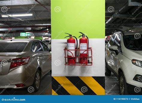 Fire Extinguisher In Underground Basement Car Parking Stock Image