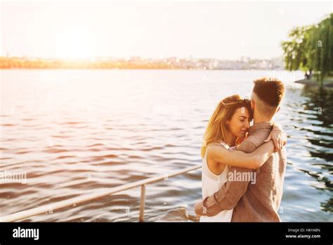 Man And Woman Posing On The Lake Stock Photo Alamy