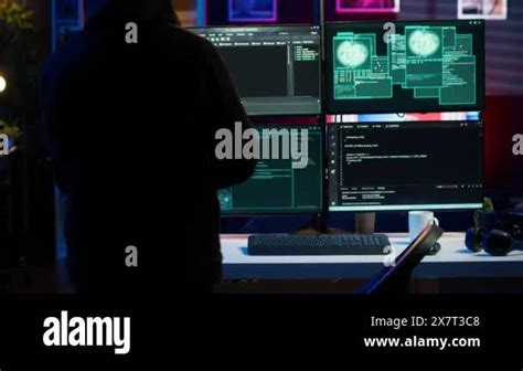 Hacker Arriving In Hidden Underground Shelter With Laptop Prepared To Launch Malware Attack On