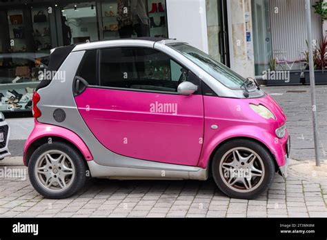 Bright Pink Smart Fortwo A Two Seater City Car Built By The Smart Division Of The Mercedes Benz