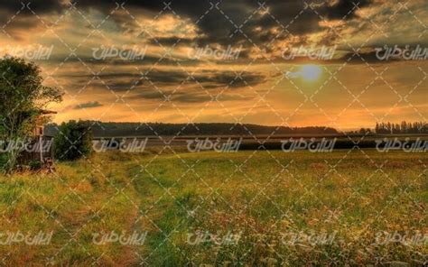 تصویر با کیفیت چشم انداز زیبای غروب آفتاب همراه با منظره و طبیعت زیبا ایران طرح