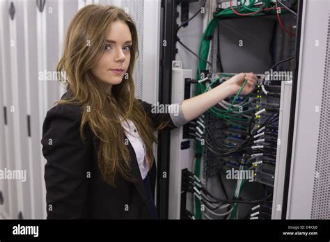 Girl Working On Mounted Rack Servers Stock Photo Alamy