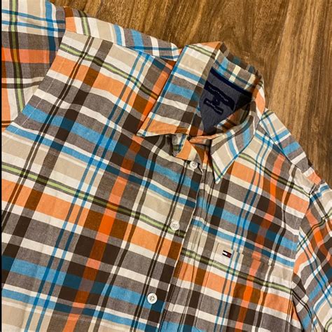 کمدا قیمت و خرید پیراهن مردانه مارک تامی رنگ آبیسفیدنارنجی