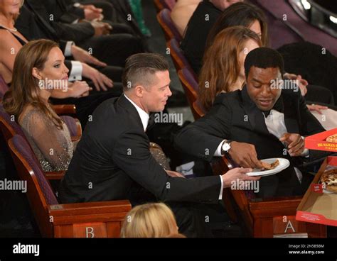 Angelina Jolie Left Looks On As Brad Pitt Shares A Slice Of Pizza