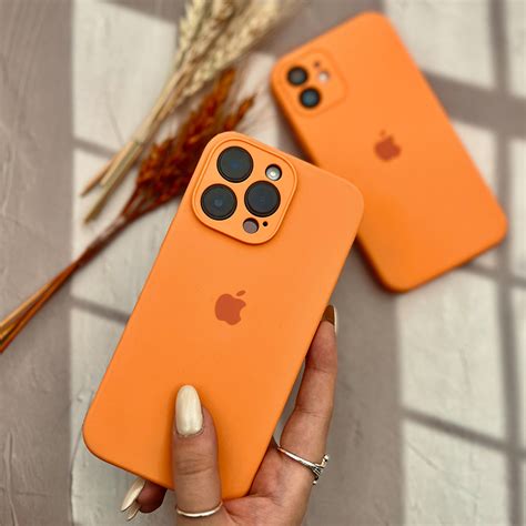 قاب گوشی آیفون سیلیکونی پاک کنی اورجینال داخل پارچه ای محافظ لنزدار رنگ