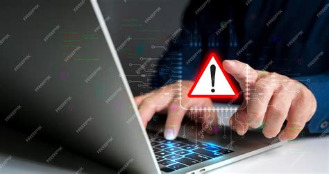 Premium Photo System Hacked Warning Alert Person Use Laptop With Virtual Warning Sign For
