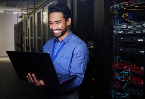Premium Photo Man Server Room And Computer For Happy Programming