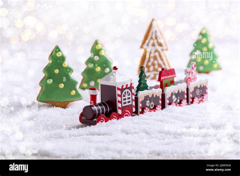Christmas Toy Train With A Christmas Tree And Gifts Stock Photo Alamy