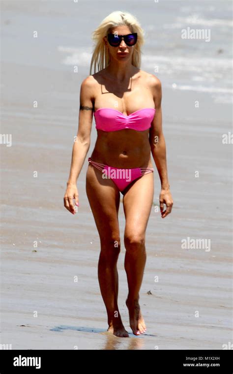 Frenchy Morgan Wearing A Tiny Pink Bikini On The Beach In Malibu