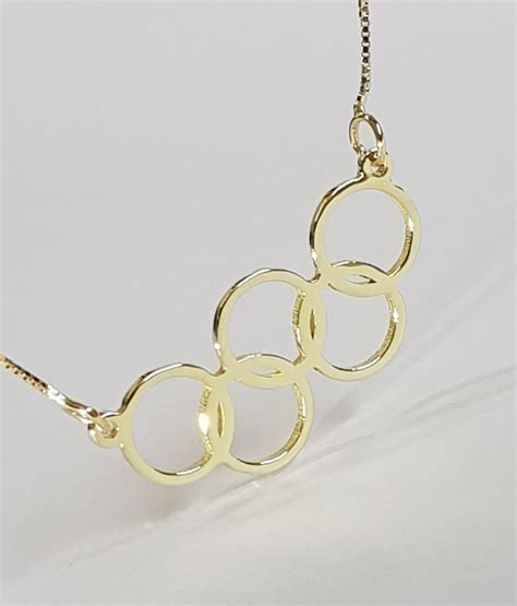 Olympic Rings Gold Necklace At Jeremiah Jobe Blog
