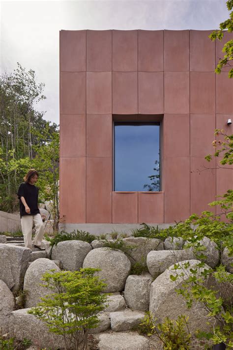 Studio Weave Nestles Pink Seosaeng House Into South Korean Hillside