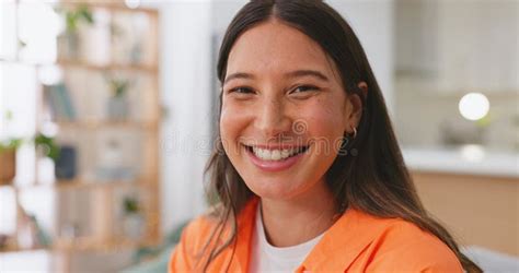 Face Happy And Woman On Couch Relax And Positive In Living Room
