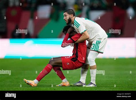 Algerias Jaouen Hadjam Helps Sudans Yasir Mozamil Get Back Up After A