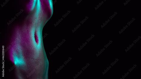 Sexy Naked Wet Body Of A Girl With Water Drops A Skinny Belly In The Neon Light Stock Photo