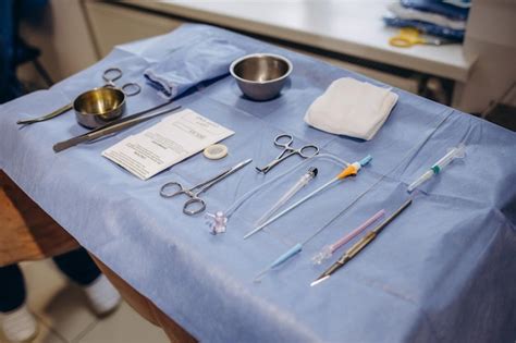 Premium Photo Different Surgical Instruments Lying On The Surgical Table Steel Medical